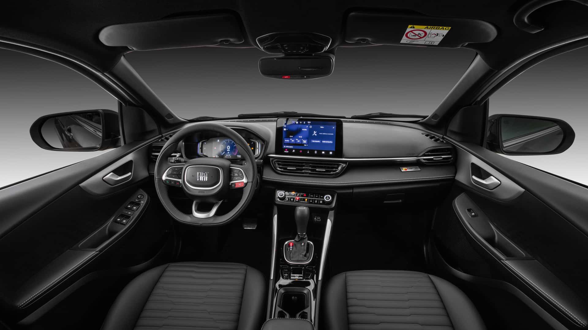 Foto interna do Fiat Fastback Limited Edition 2024, exibindo o painel ...